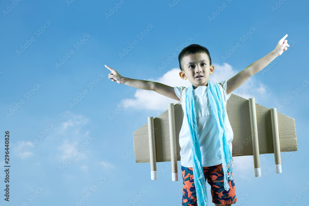 Kid pilot with toy jetpack. Stock Photo | Adobe Stock
