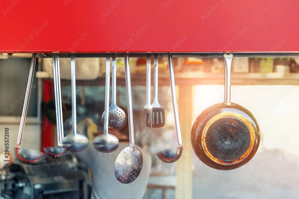 Street food open shop-window with stainless steel set of kitchenware ...