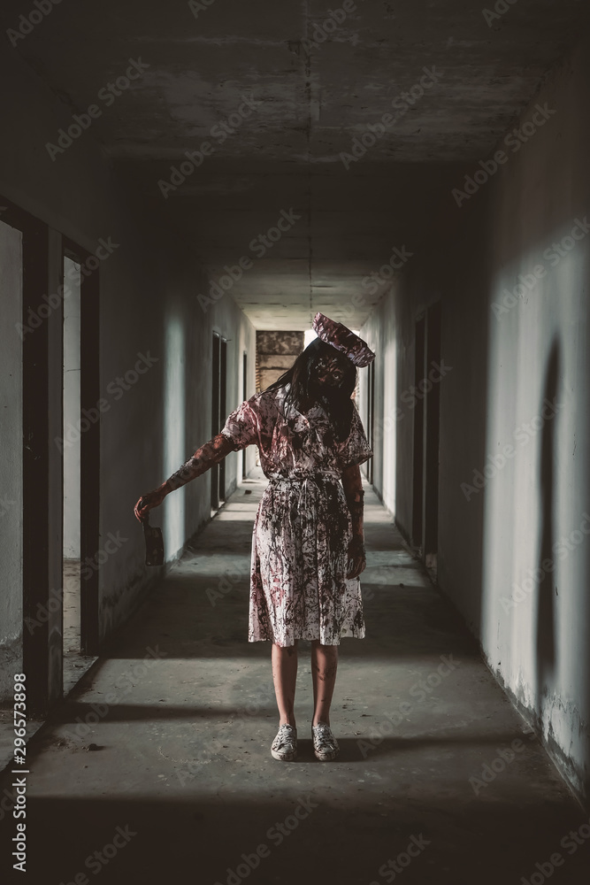 Ghost nurse woman or zombie holding the knife with resentment and ...