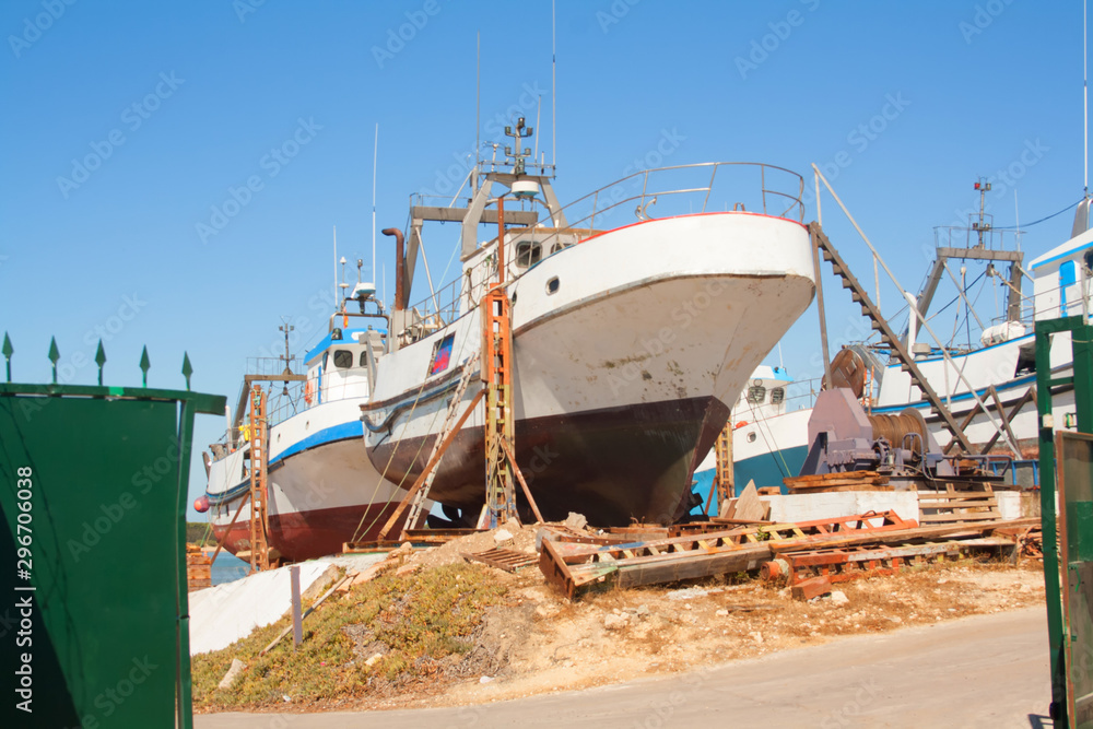 Ships undergo dock repairs to eliminate defects in the underwater part ...