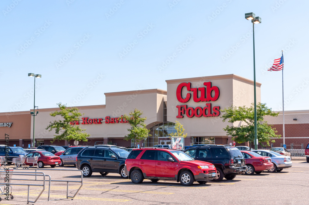 Customers parked cars in front of the building of Cub Foods. The place ...