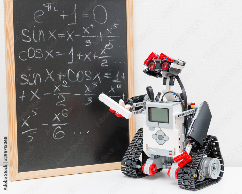 Minsk, Belarus. February, 2017: Teenager schoolboy constructs and ...