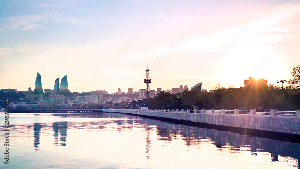 Baku city at sunset. Panoramic view of the skyline with sea boulevard ...
