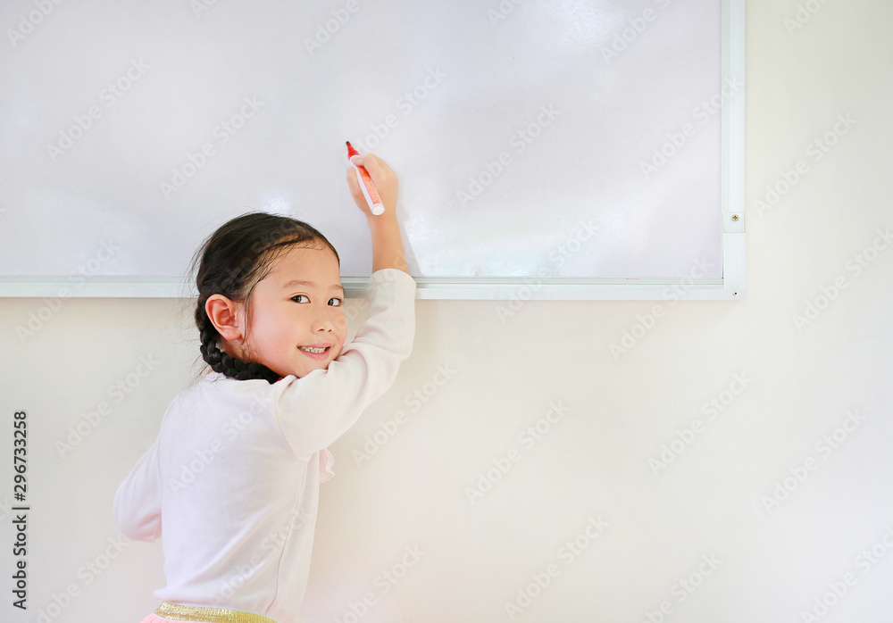 Child Writing On Whiteboard