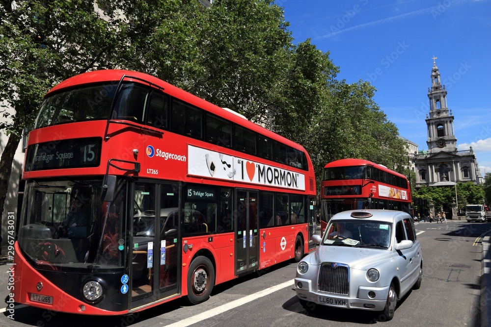 LONDON, UK - JULY 6, 2016: New Routemaster bus and a taxi cab in London ...