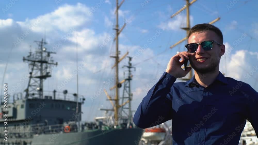 Young attractive emotional bearded sailor seamen captain tourist skiper ...