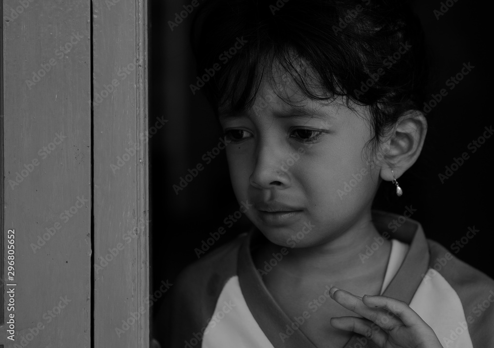 Little Asian girl showed sad expression. Cute Indonesian kid. Stock ...