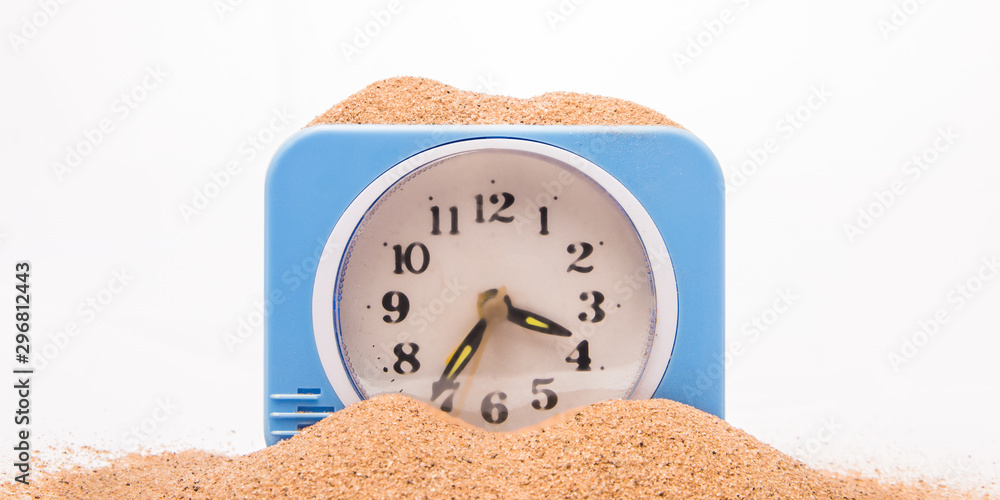Sand and alarm clock with a dial as a symbol of an hourglass. Stock ...