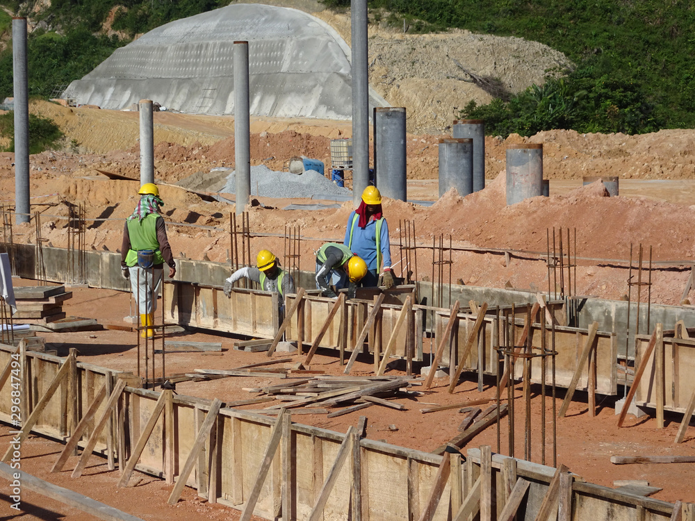 KUALA LUMPUR, MALAYSIA -MARCH, 2019: Construction workers installing ...