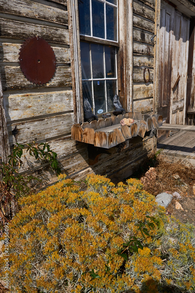 Log built building houses a Blacksmiths shop on main street in Virginia ...
