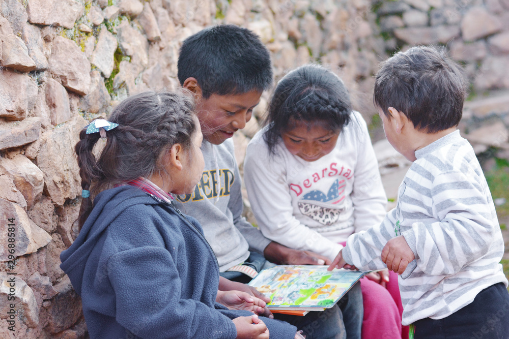 Native american kids reading a book. Stock Photo | Adobe Stock