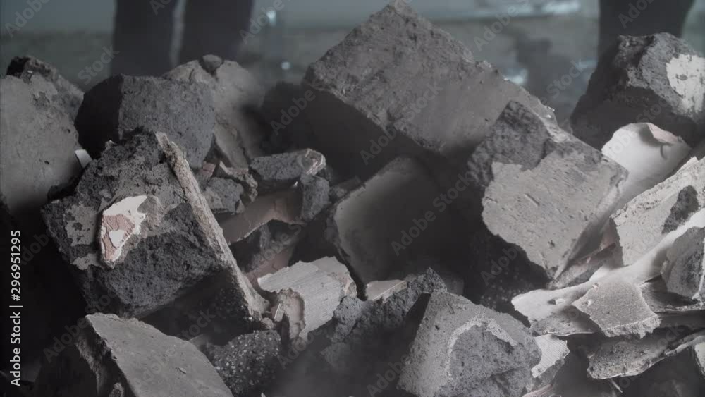 Big heavy blocks on the floor. Demolition work in apartment ...