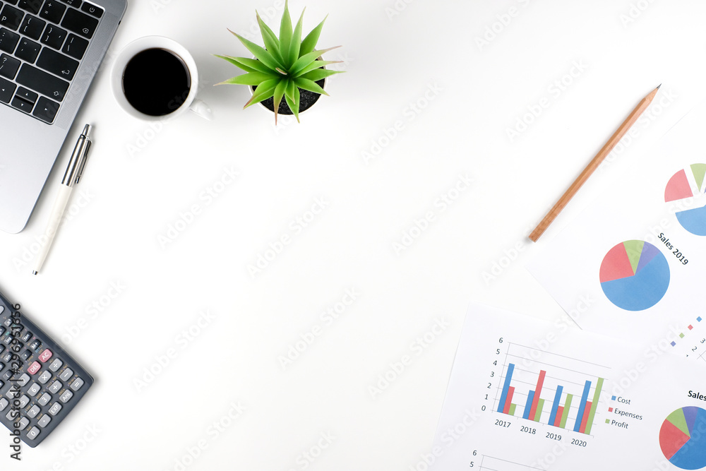 Work space white office table desk with business graph documents and ...