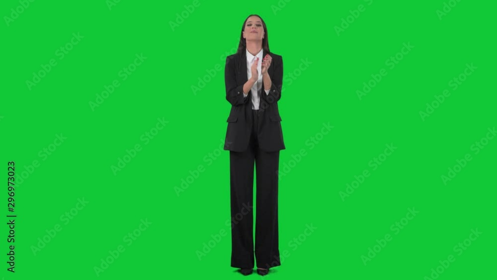 Young happy business woman congratulating and applauding clapping hands ...