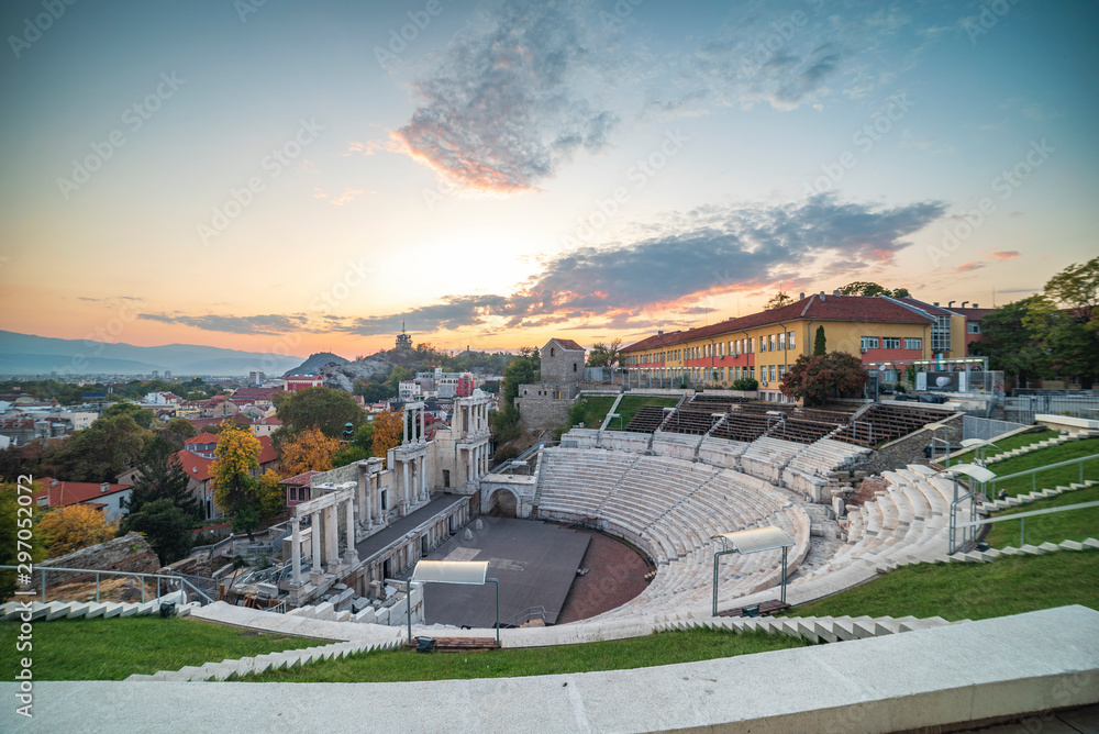 Bulgaria, Plovdiv city. Warm sunset panorama over Roman Amphitheatre in ...