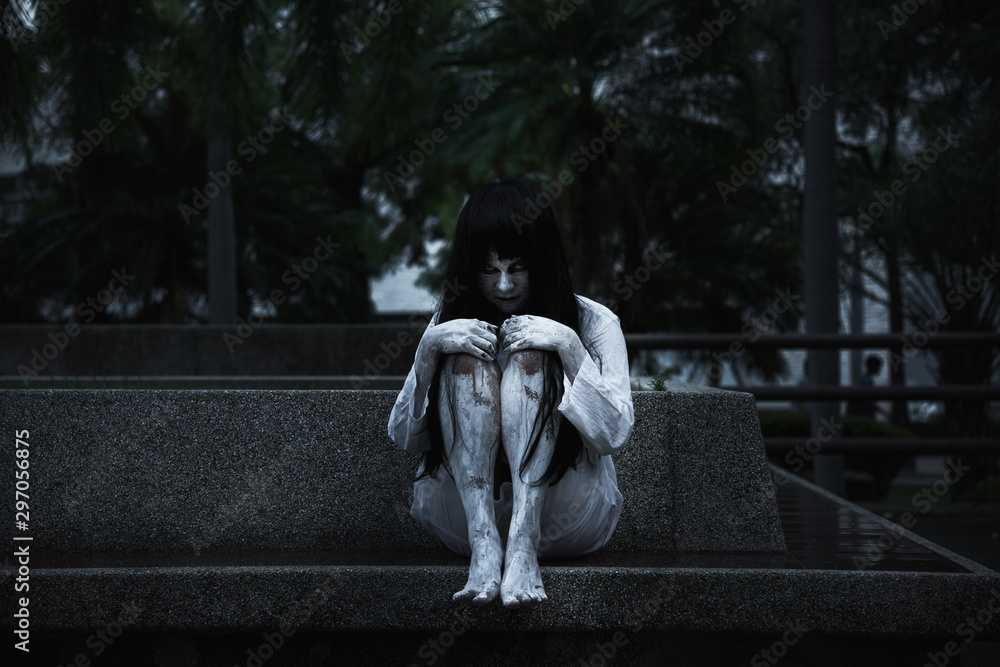 Woman ghost horror sitting her hug, Stock Photo | Adobe Stock