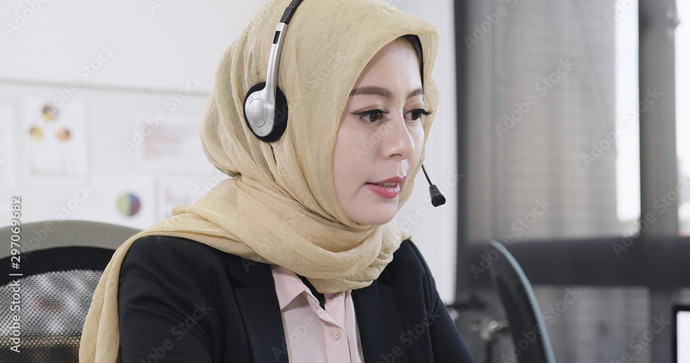focus close up portrait of happy charming young islam woman sitting and ...