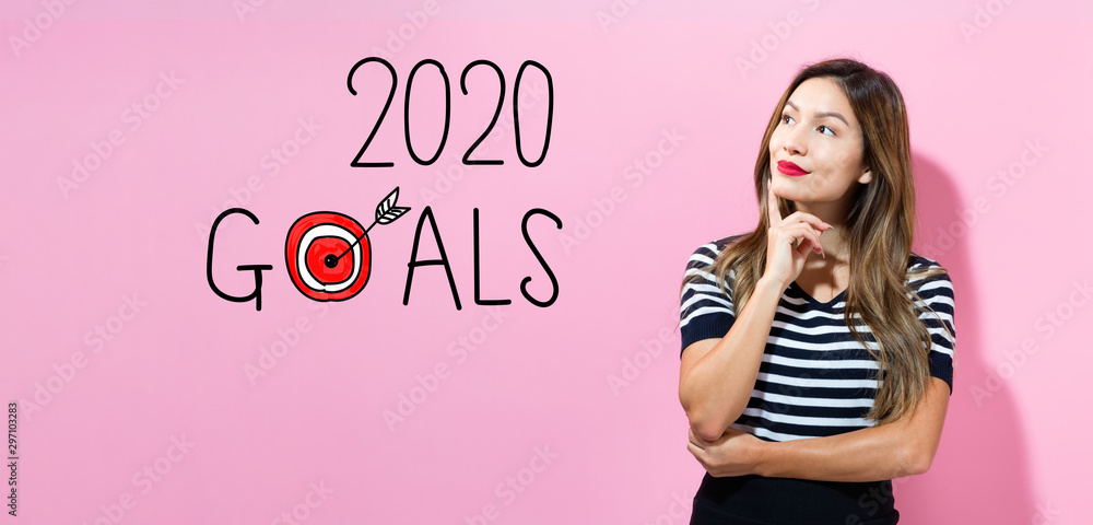 2020 Goals with young woman in a thoughtful pose Stock Photo | Adobe Stock