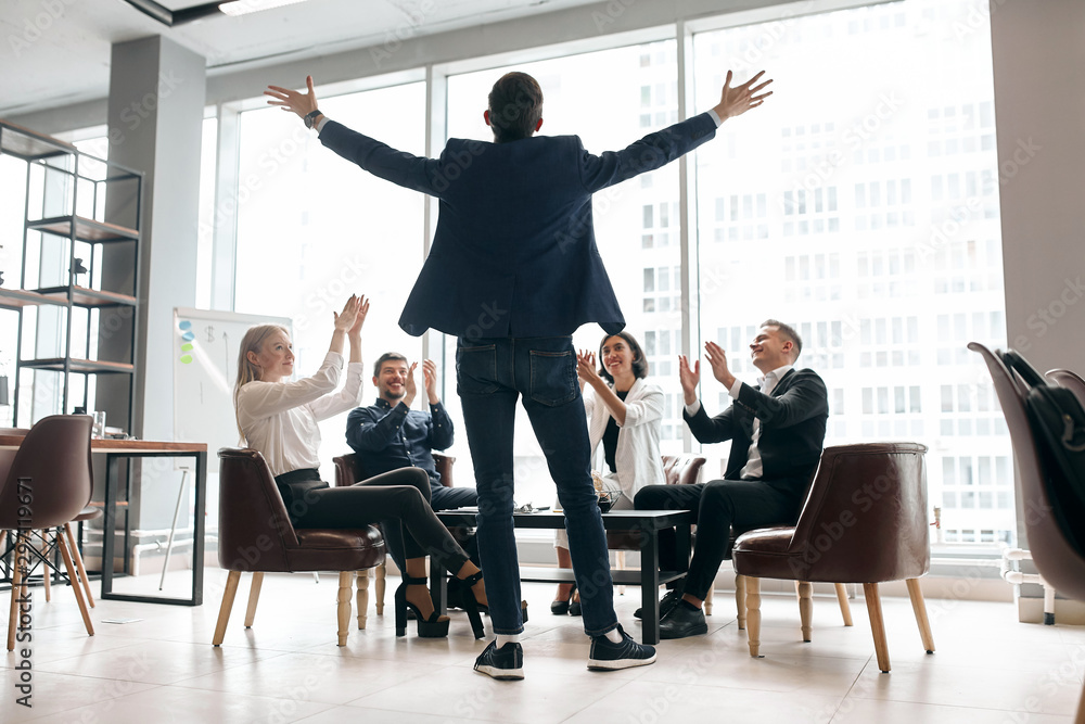 business people congratulating their parter with successful deal which ...