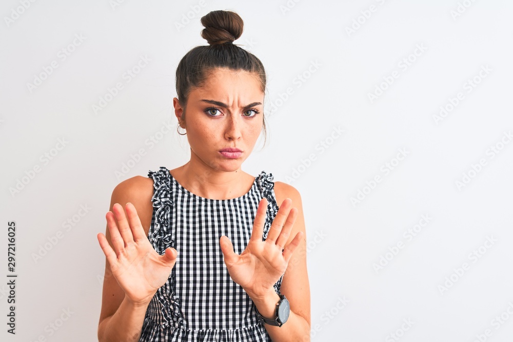 Beautiful Woman With Bun Wearing Casual Dresss Standing Over Isolated