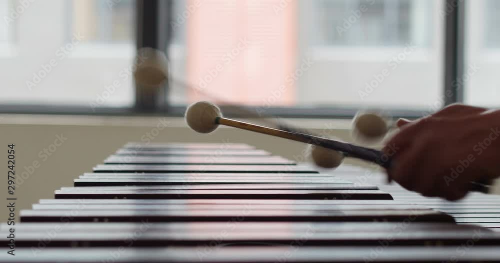 Vídeo do Stock: man hands playing marimba, on side view. Marimba is a ...