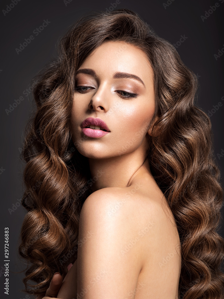 Beautiful woman with long brown hair. Beautiful face of an attractive ...