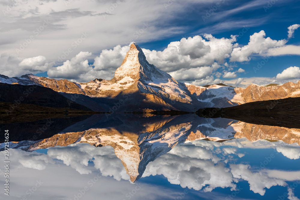 Matterhorn peak reflected in Stellisee Lake in Zermatt, Switzerland ...