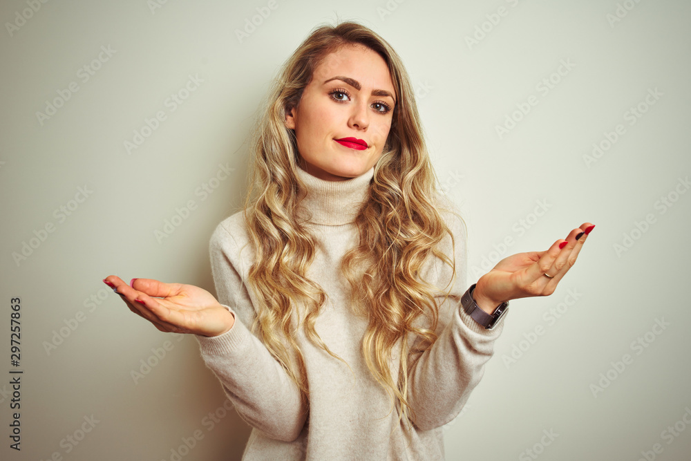 Beautiful woman wearing winter turtleneck sweater over isolated white ...