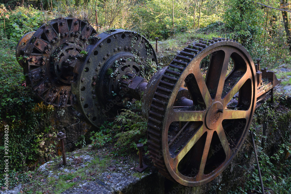 Gears and cogs on the water wheel on the Luxulyan Valley Cornwall Stock ...