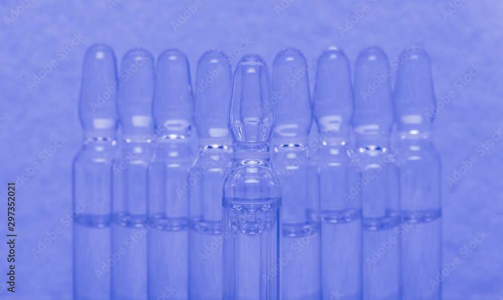 Glass medical ampoule vial for injection. Medicine is liquid sodium ...