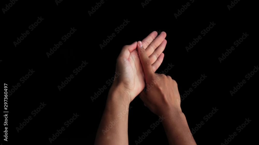 Human hands come up and show double-handed British Sign Language or BSL ...