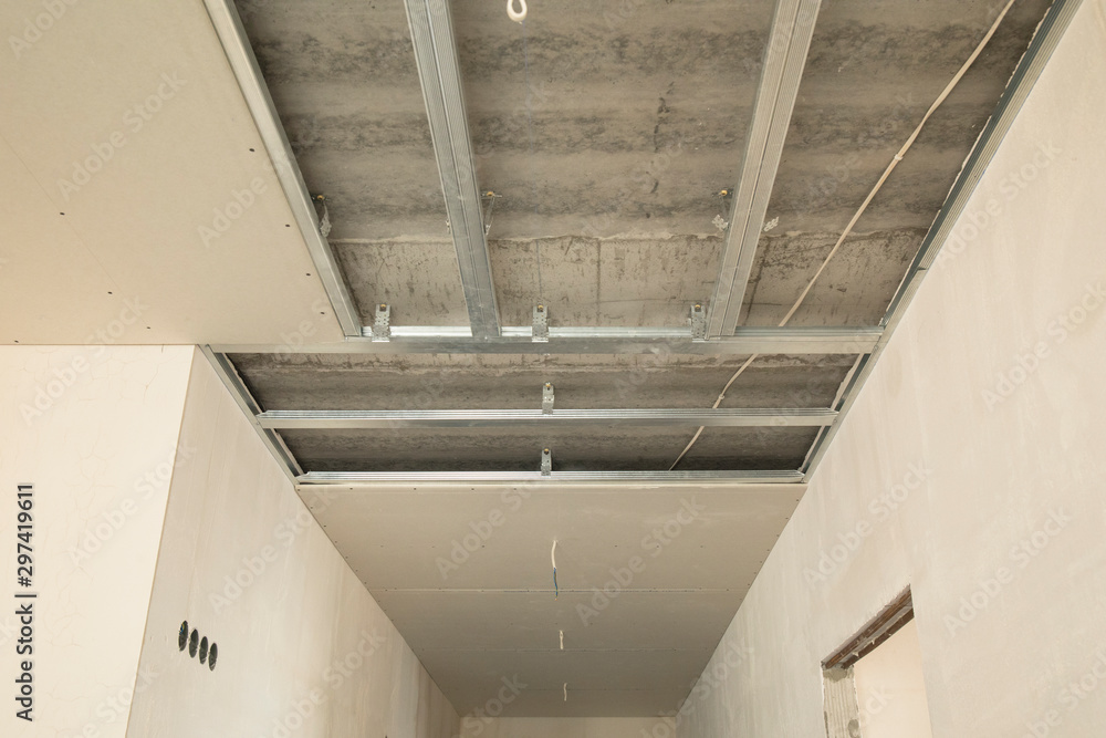 Installation the ceiling profile in the new flat Stock Photo | Adobe Stock