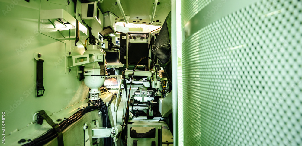 Interior view of empty multi-role armored military vehicle personnel ...