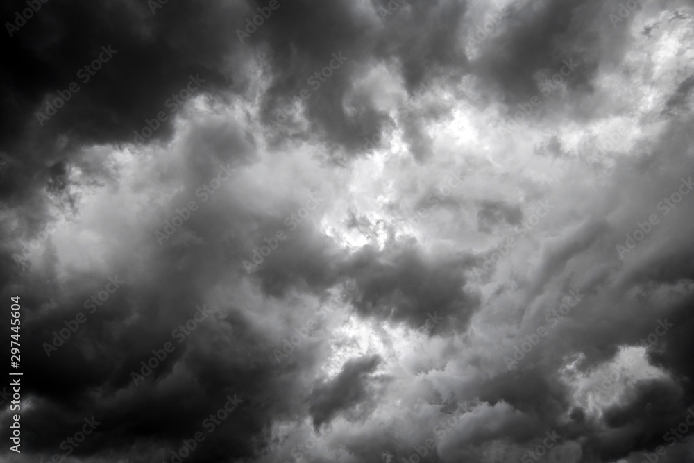 Dark sky and dramatic black cloud before rain.A tropical cyclone is a ...