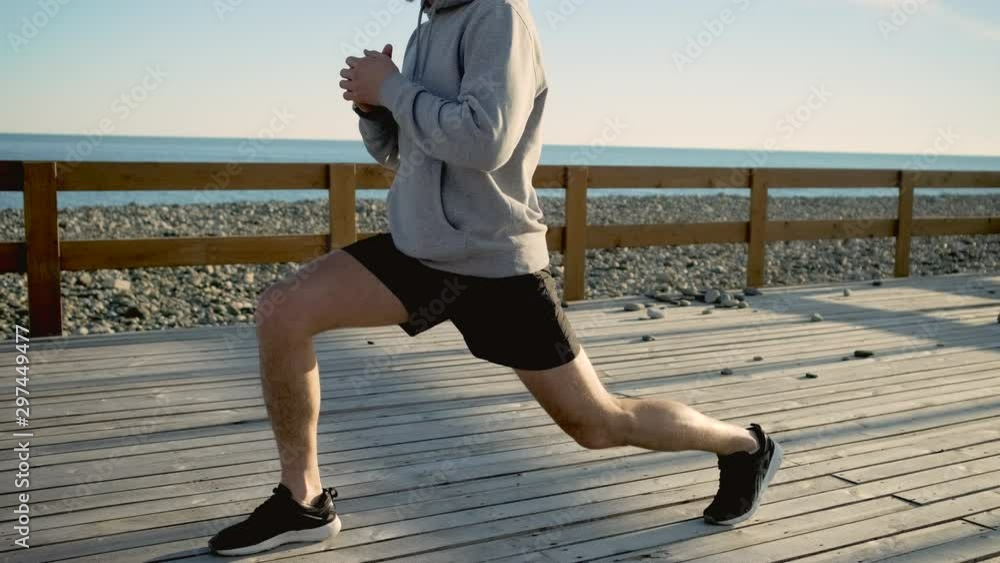 Dynamic stretching exercise Stock Video | Adobe Stock