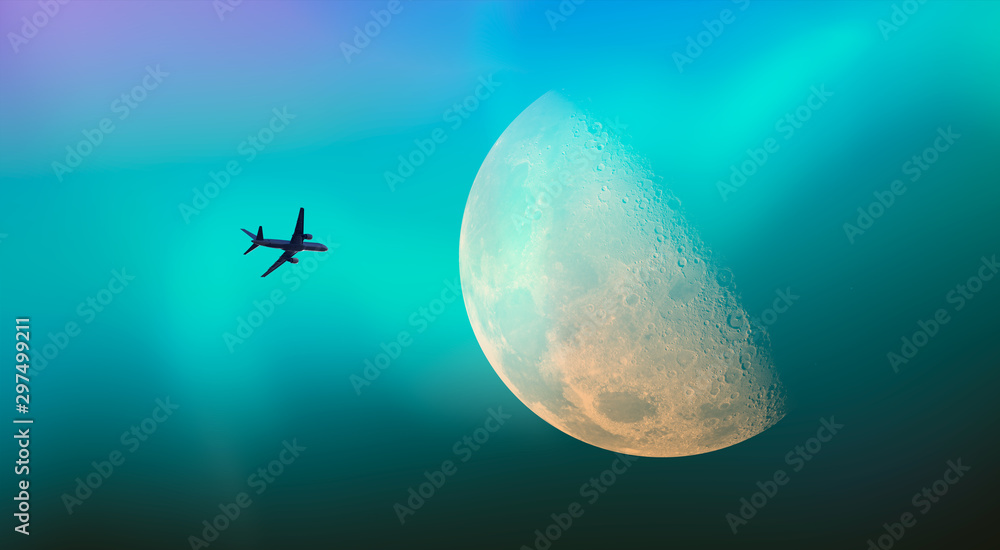 Passenger airplane in the sky against blue full moon and aurora ...