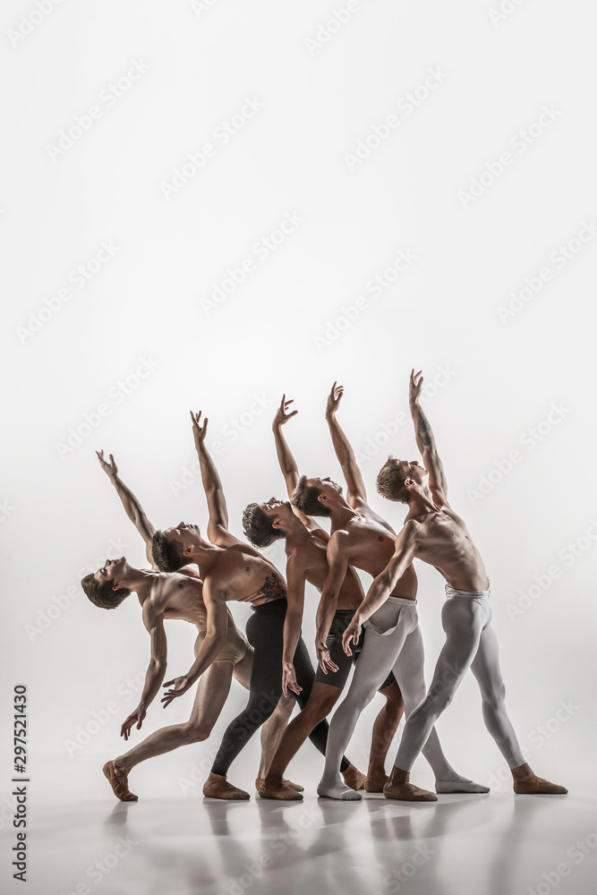 The group of modern ballet dancers. Contemporary art ballet. Young ...
