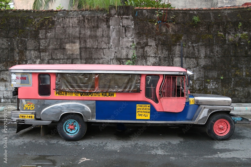 MANILA, PHILIPPINES - NOVEMBER 24, 2017: Jeepney public transportation ...