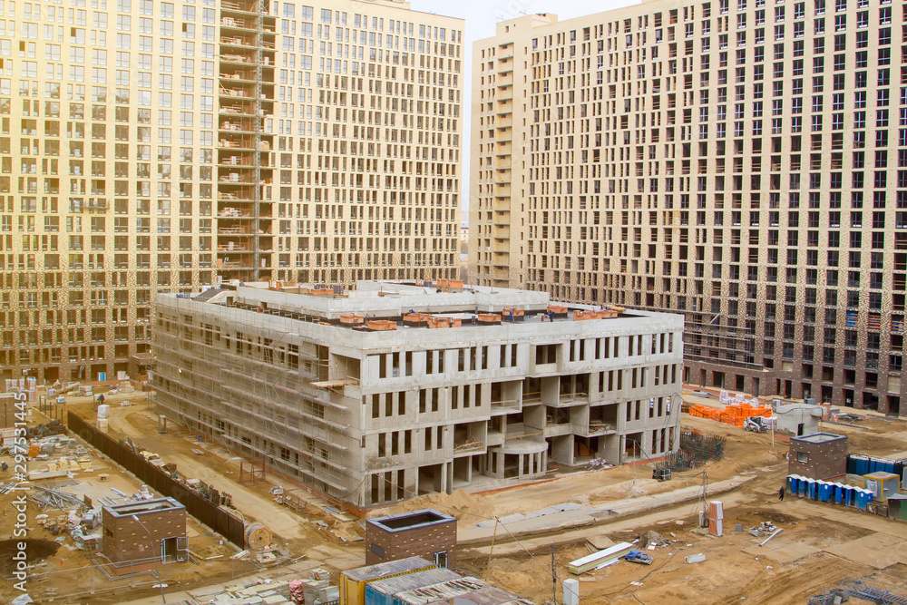 school building under construction in courtyard of apartment buildings ...