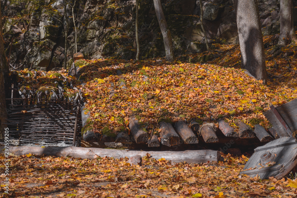 Dugout (or dug-out, pit-house, earth lodge, cellar dug) from logs in ...