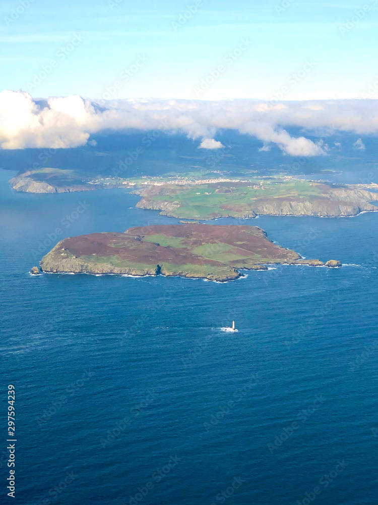 Aerial view of the Calf of Man with the lighthouse, the most southern ...