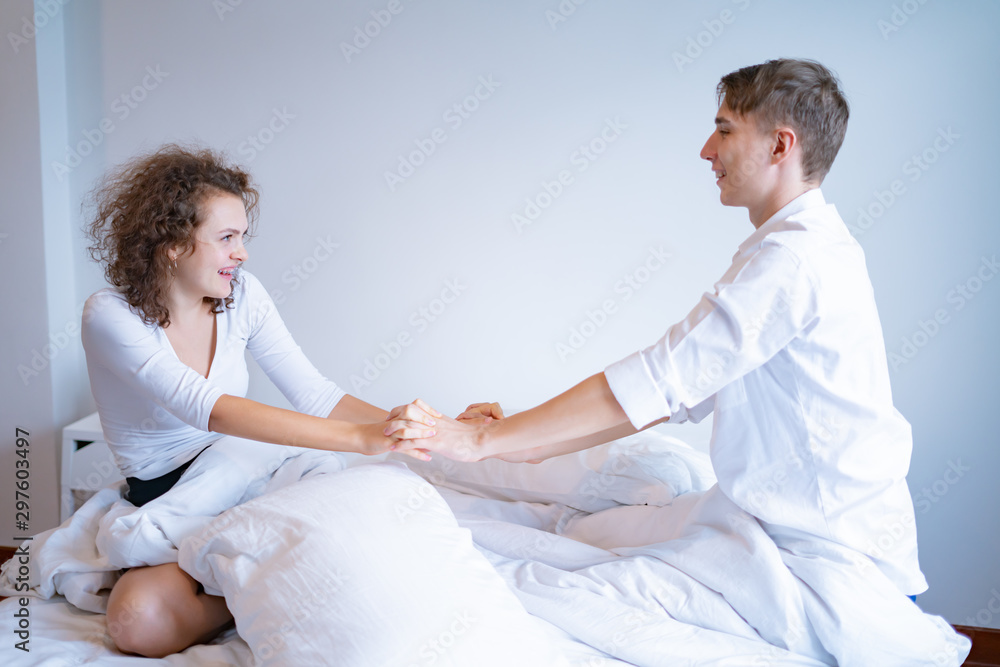 Pillow fight pajama party and Sleepover party ideas concept.Young happy ...