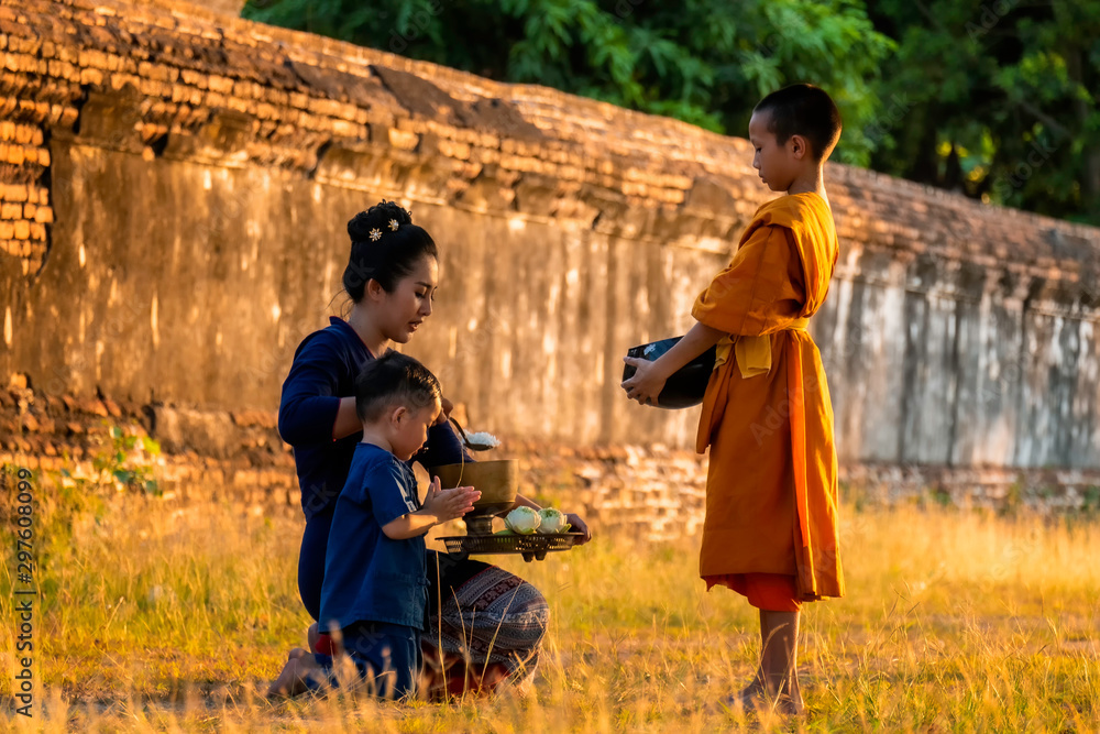 Monk Buddhist elder Novice. The family Children woman putting food ...