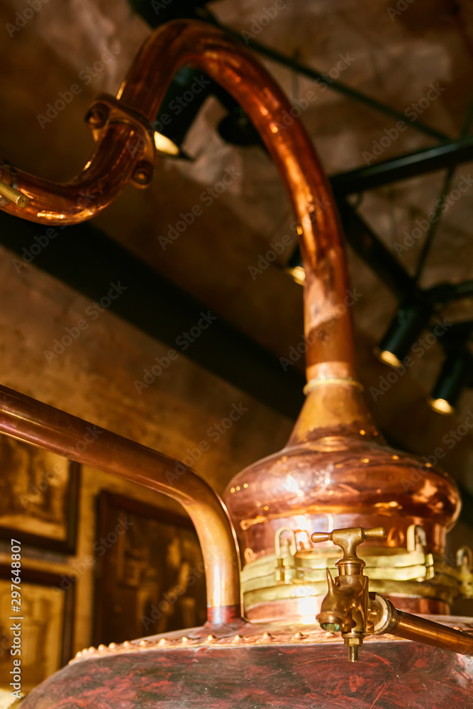Detalis of medieval traditional distiller cube made from copper ...
