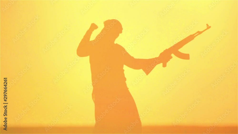 warrior with Kalashnikov at sunset day. fighter is training with a ...