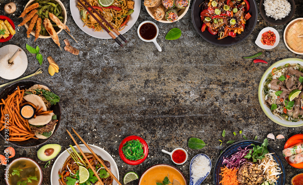 Asian food background with various ingredients on rustic stone ...