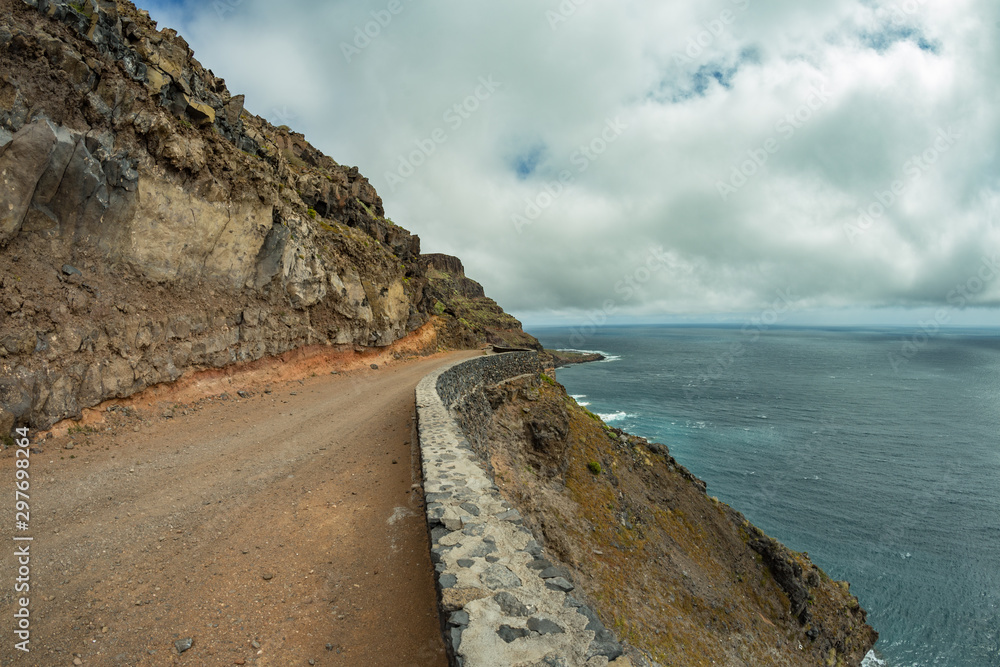 Narrow country road to the plateau of Punta Llana, where is the Ermita ...