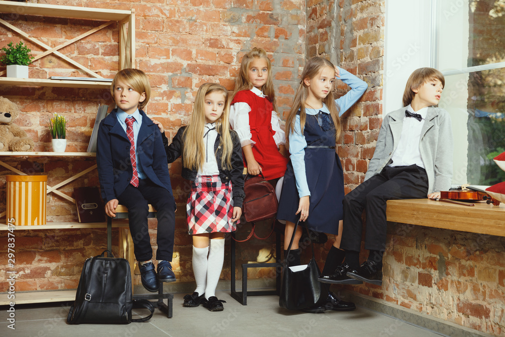 Group of kids spending time after school together. Handsome friends ...