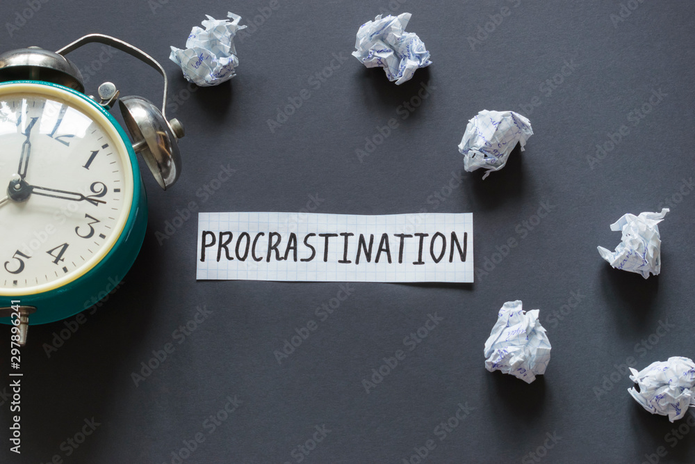 Word Procrastination and retro watch on the dark background. Stock ...