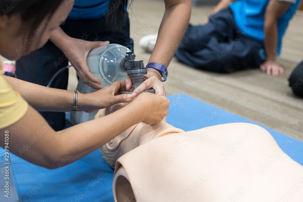 Demonstrating CPR (Cardiopulmonary resuscitation) training medical ...